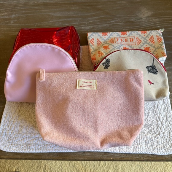 Clarins | Bags | 5clarins Cosmetic Bag All Brand New | Poshmark
